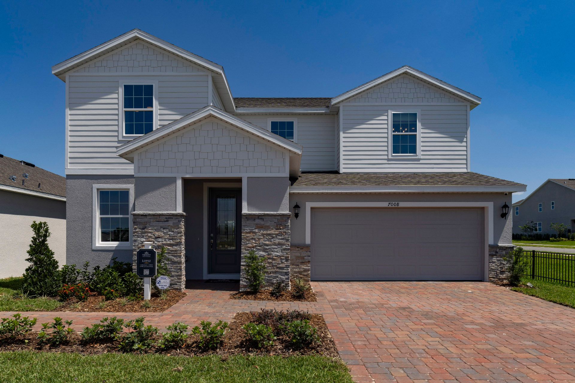 Lopez Plan at Ridgeview in Clermont, FL by Trinity Family Buildiers